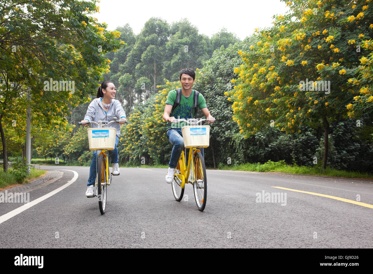 Young university student campus cycling Stock Photo - Alamy