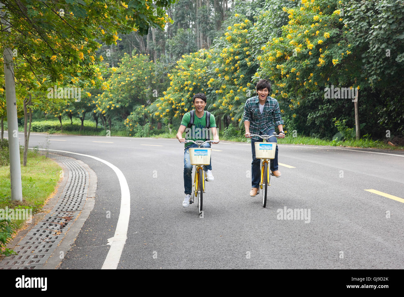 Young university student campus cycling Stock Photo - Alamy