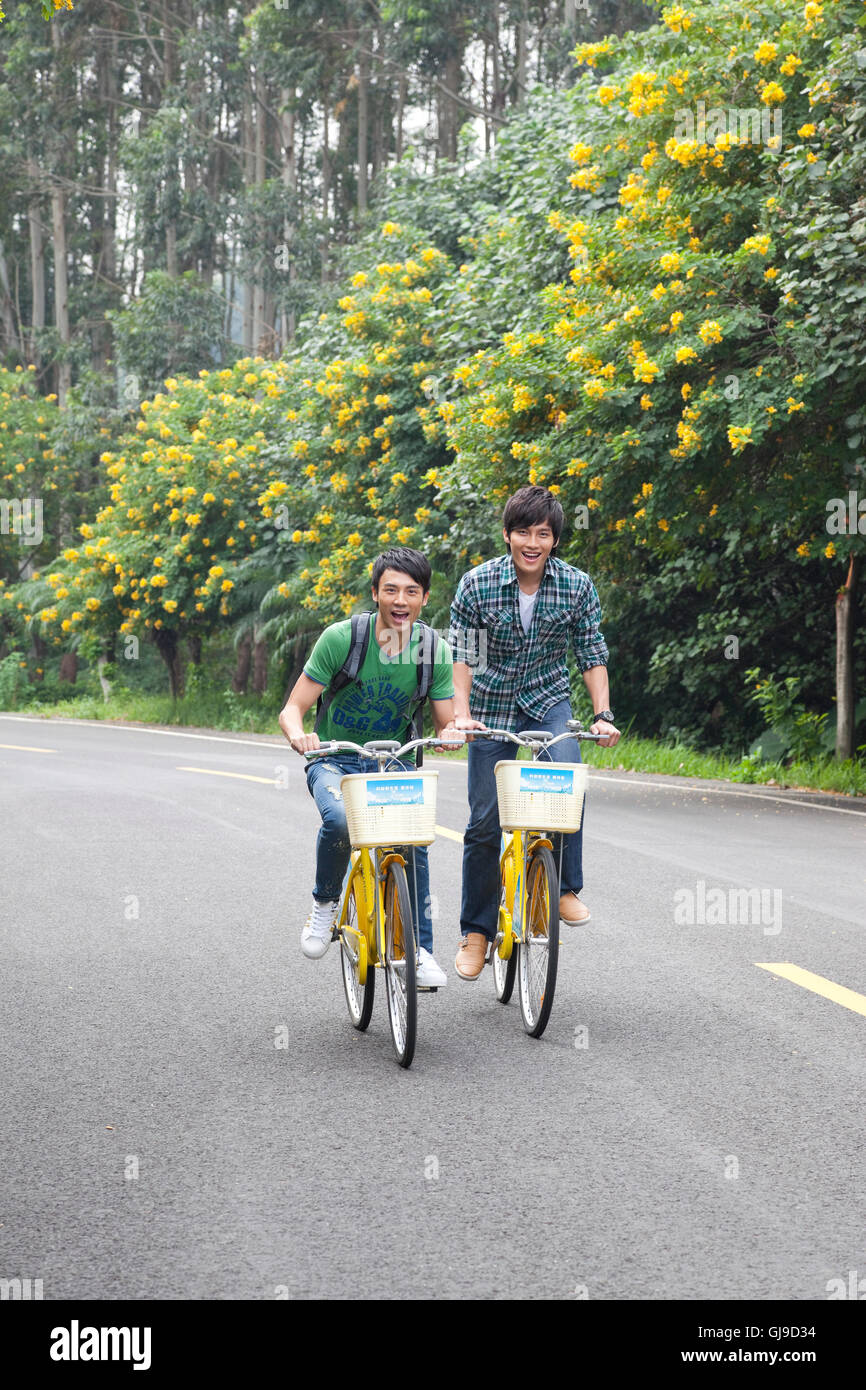 Young university student campus cycling Stock Photo - Alamy