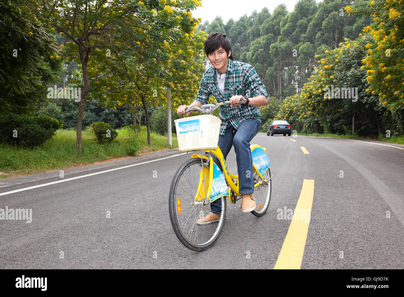Young university student campus cycling Stock Photo - Alamy