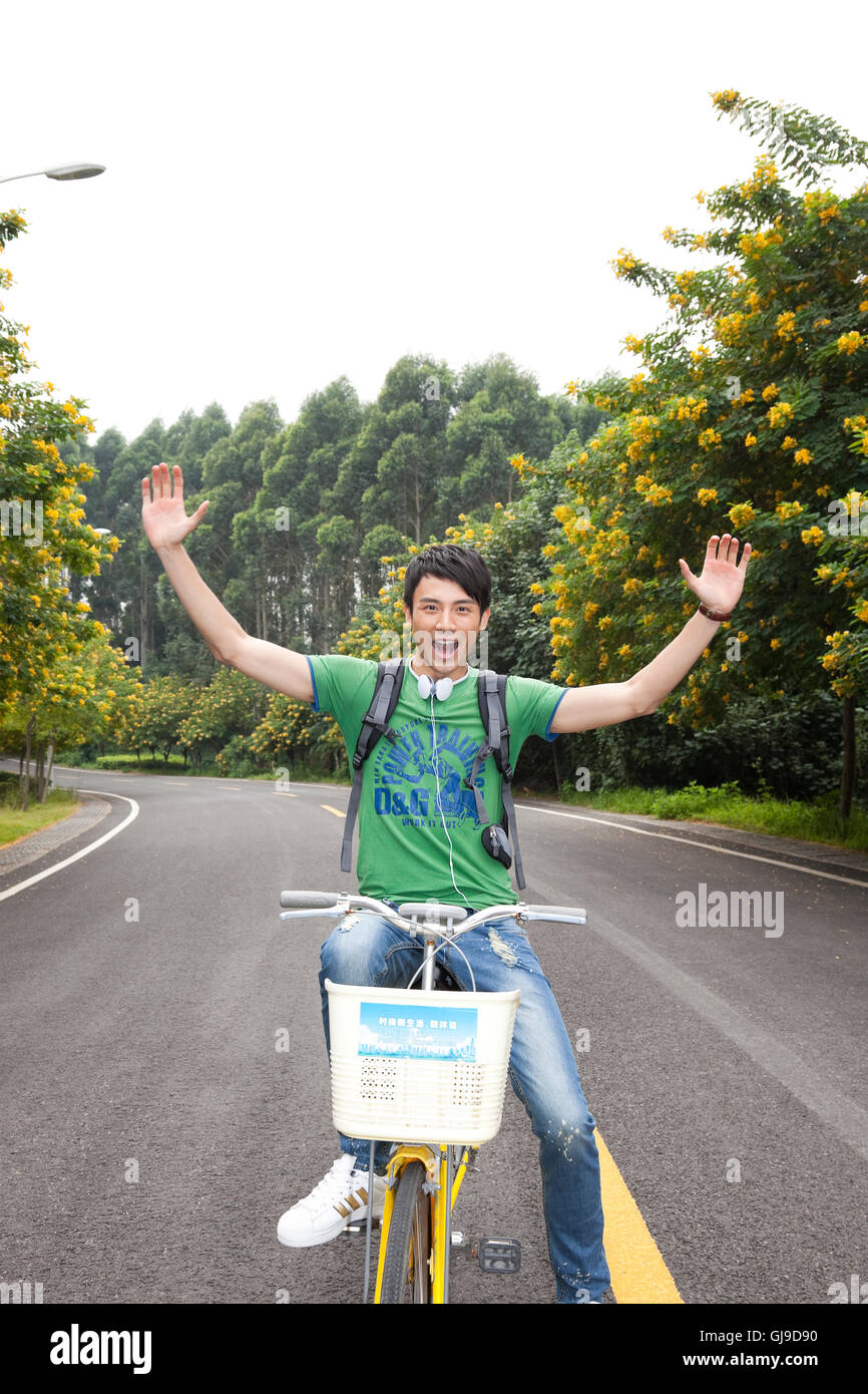 Young university student campus cycling Stock Photo - Alamy