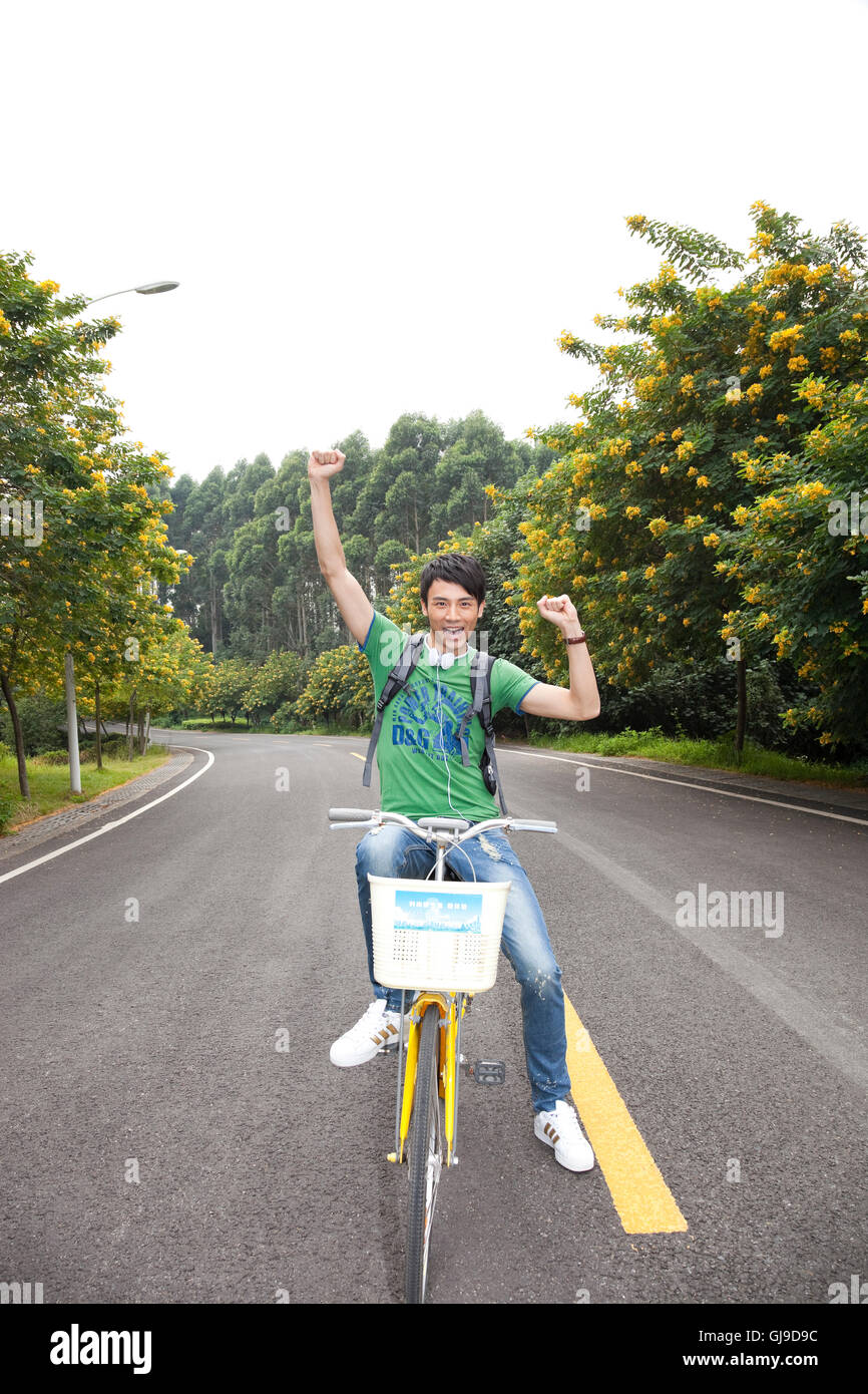 Young university student campus cycling Stock Photo - Alamy