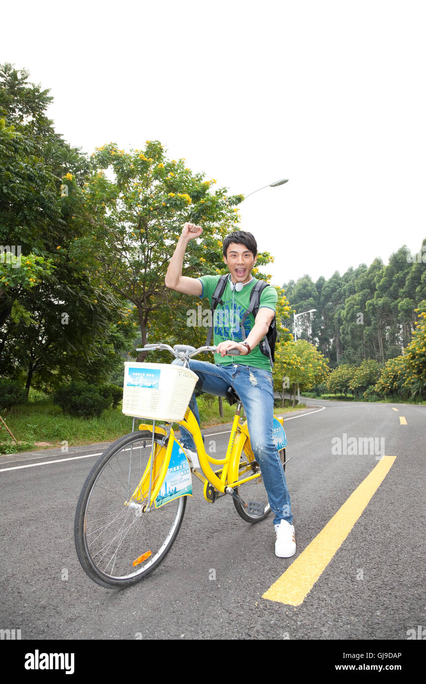 Young university student campus cycling Stock Photo - Alamy