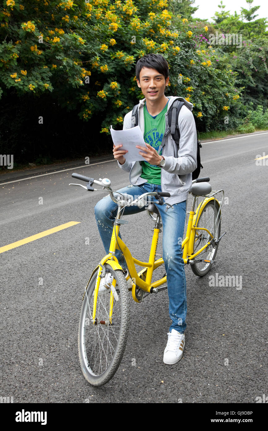 Young university student campus cycling Stock Photo - Alamy