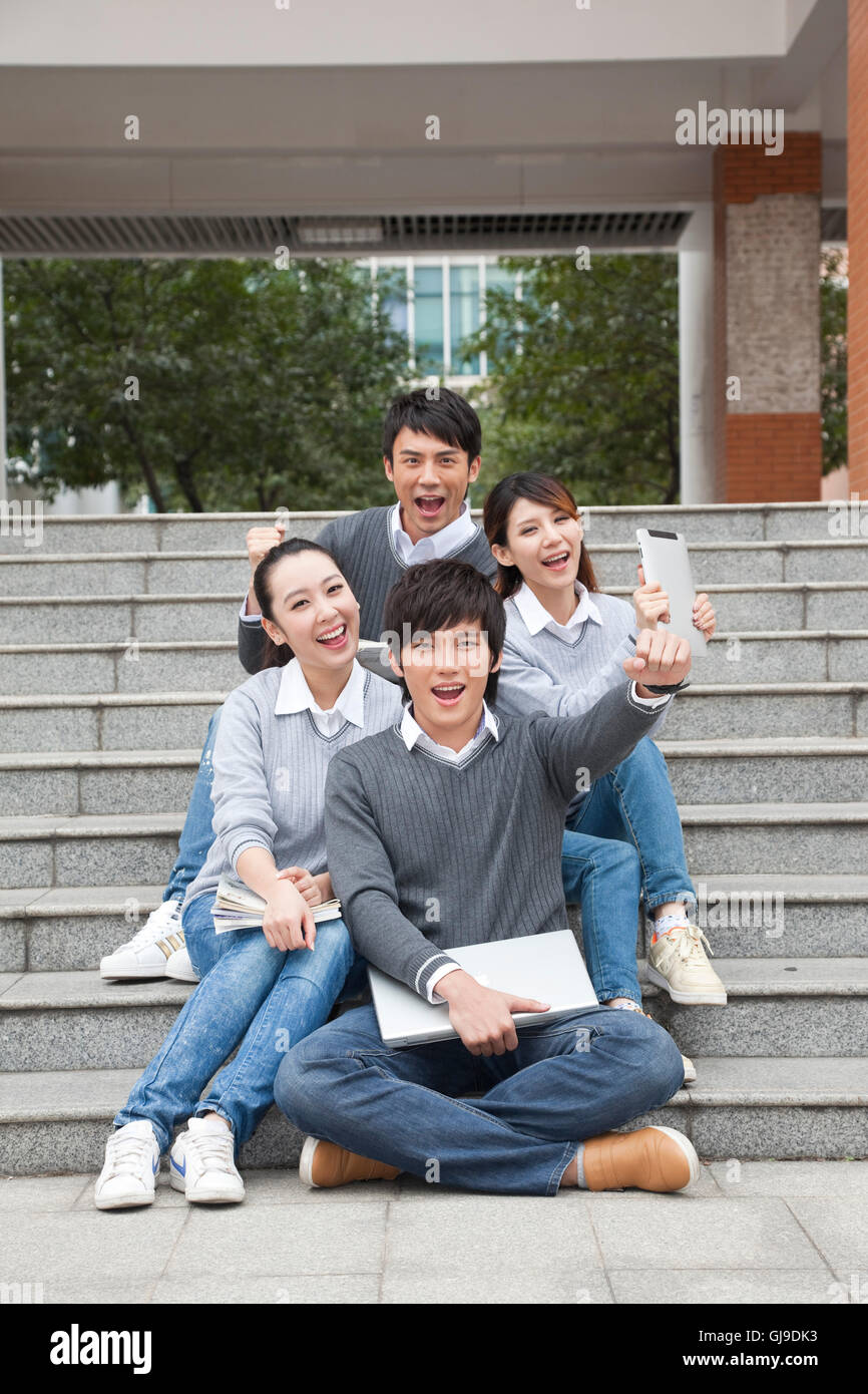 Young college students on campus to discuss Stock Photo - Alamy