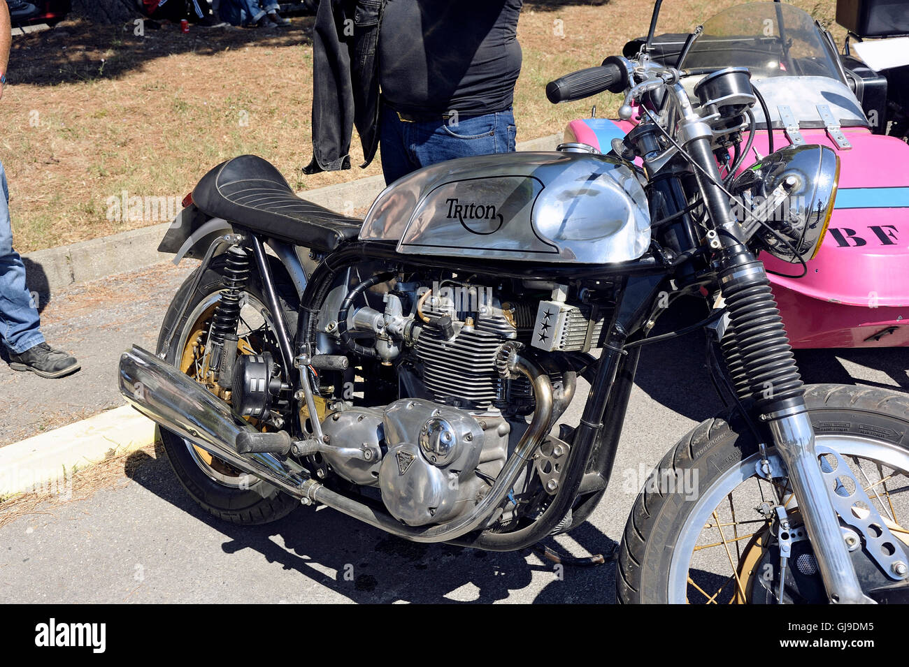 an old motorcycle triumph triton is a rare and sought after model made ...