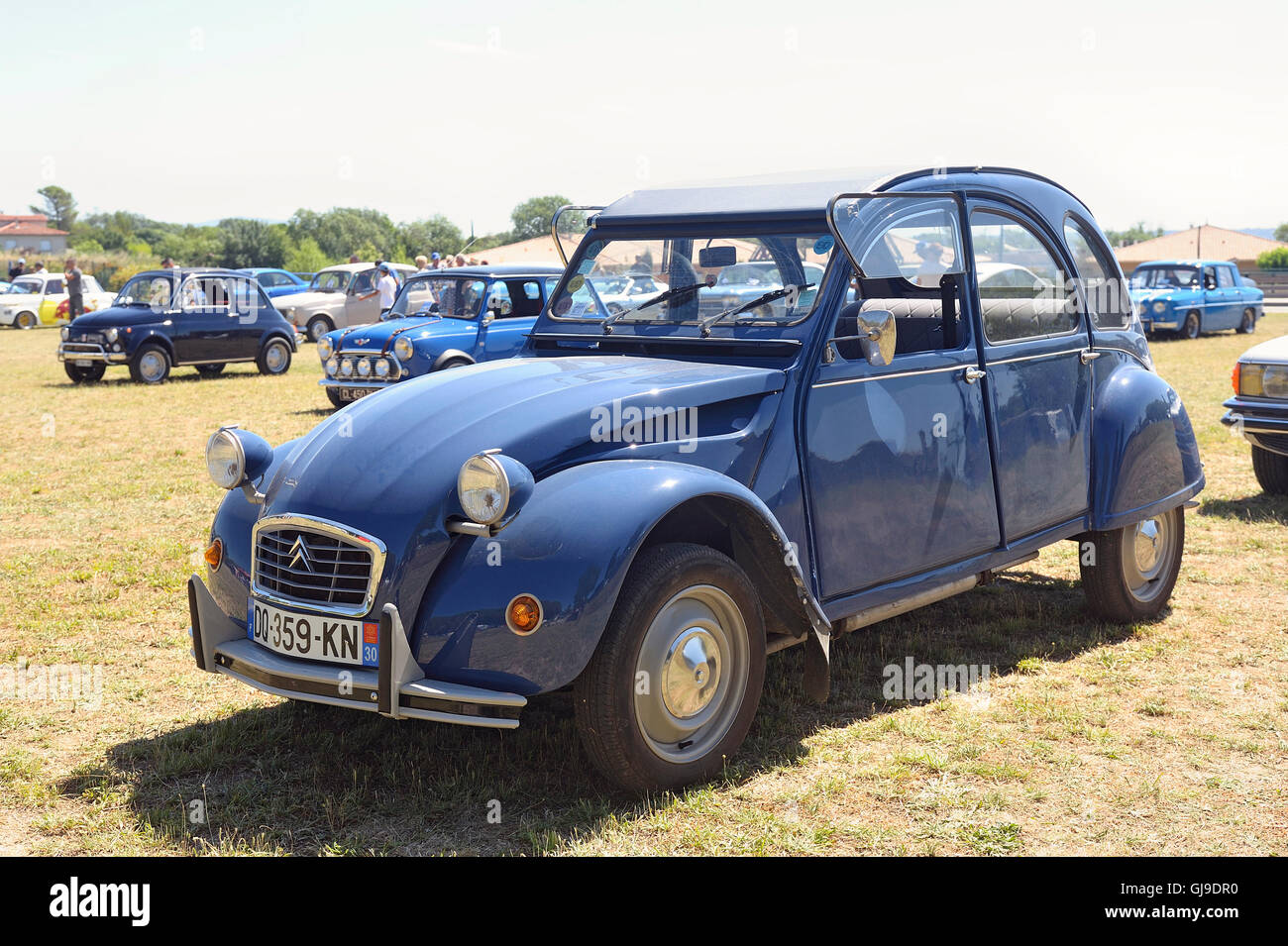 Citroen 2CV blue exhibited in a vintage car rally Stock Photo - Alamy