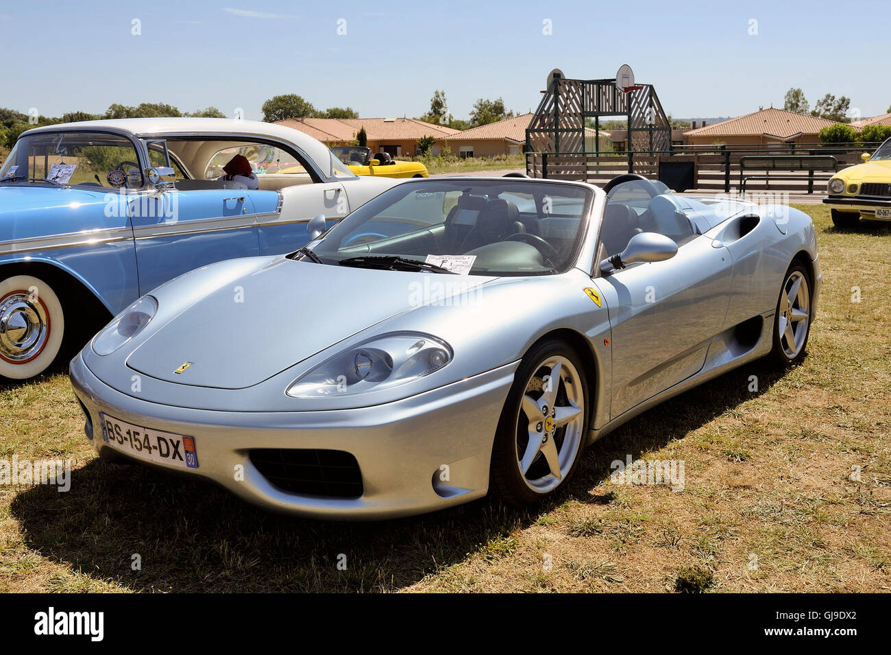 Metallic gray Ferrari 360 Spider on display in a car rally Stock Photo ...