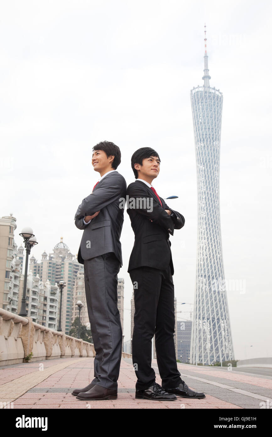 Young business man outside office building Stock Photo - Alamy