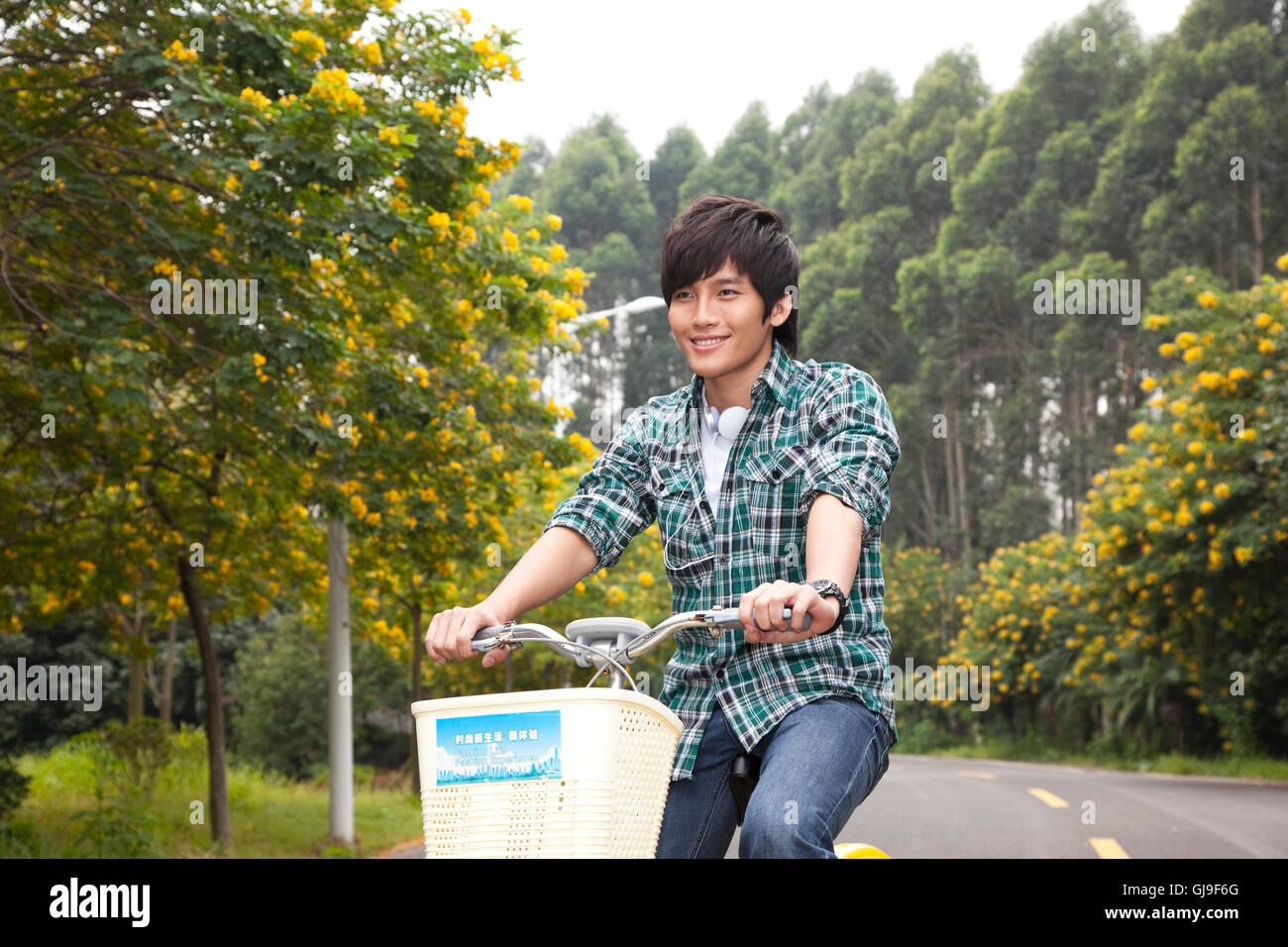 Young university student campus cycling Stock Photo - Alamy