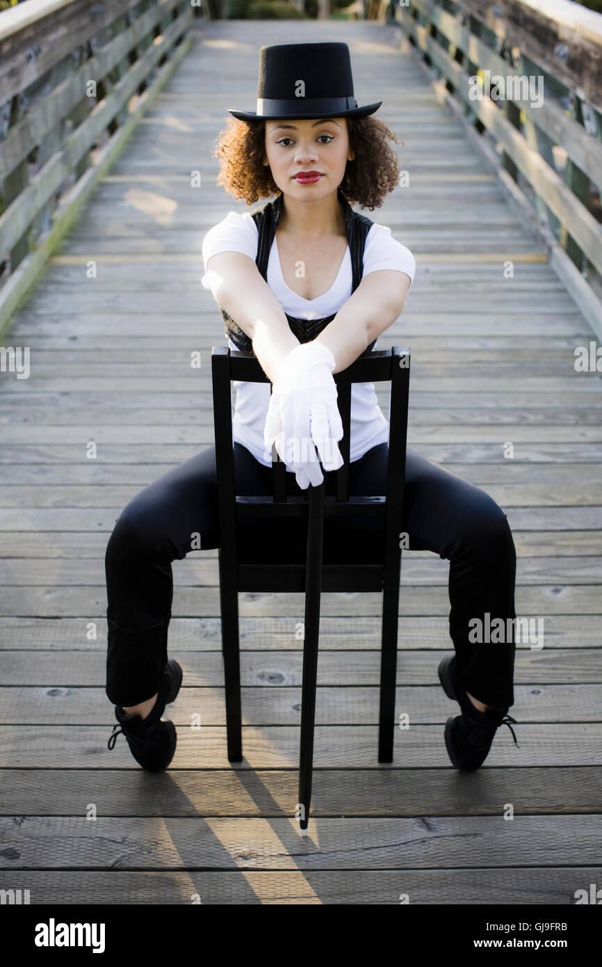 Jazz Dancer Sitting in Chair Stock Photo - Alamy