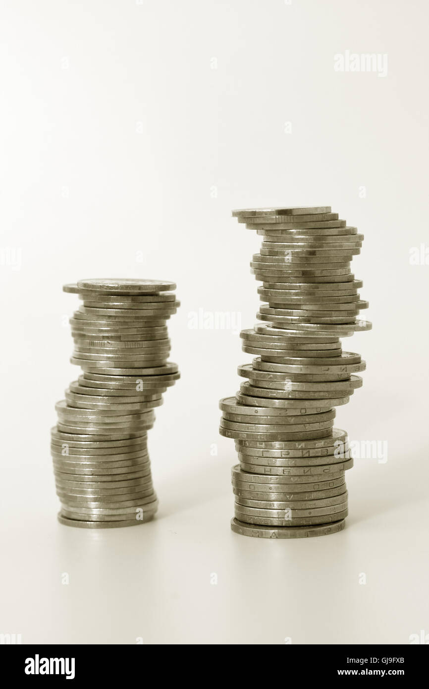 Lot coins on white background Stock Photo - Alamy