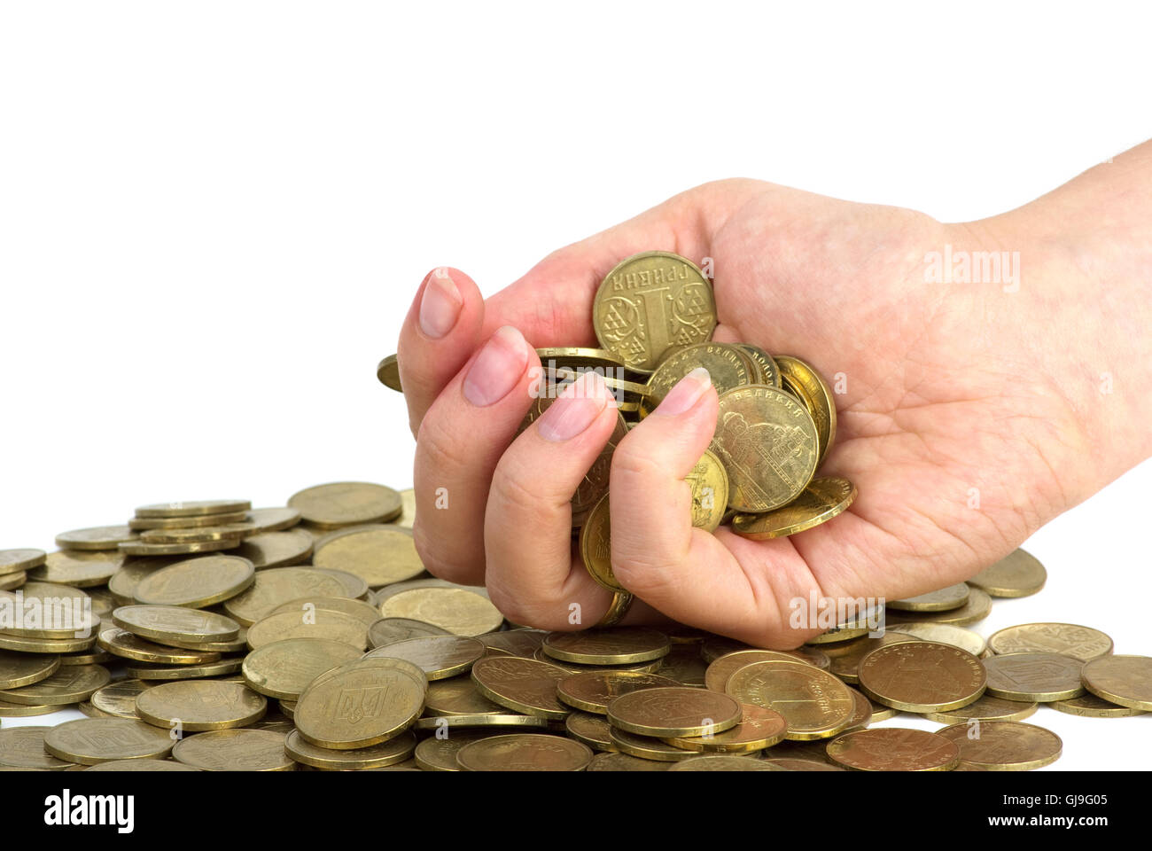Hand full of coins Stock Photo - Alamy