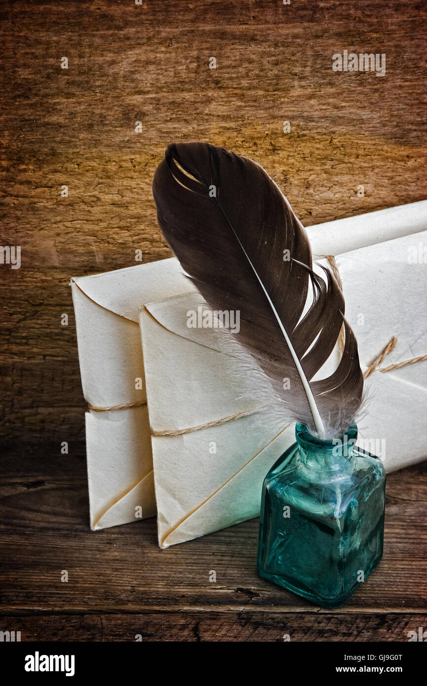 Postage on the background of an old board Stock Photo - Alamy