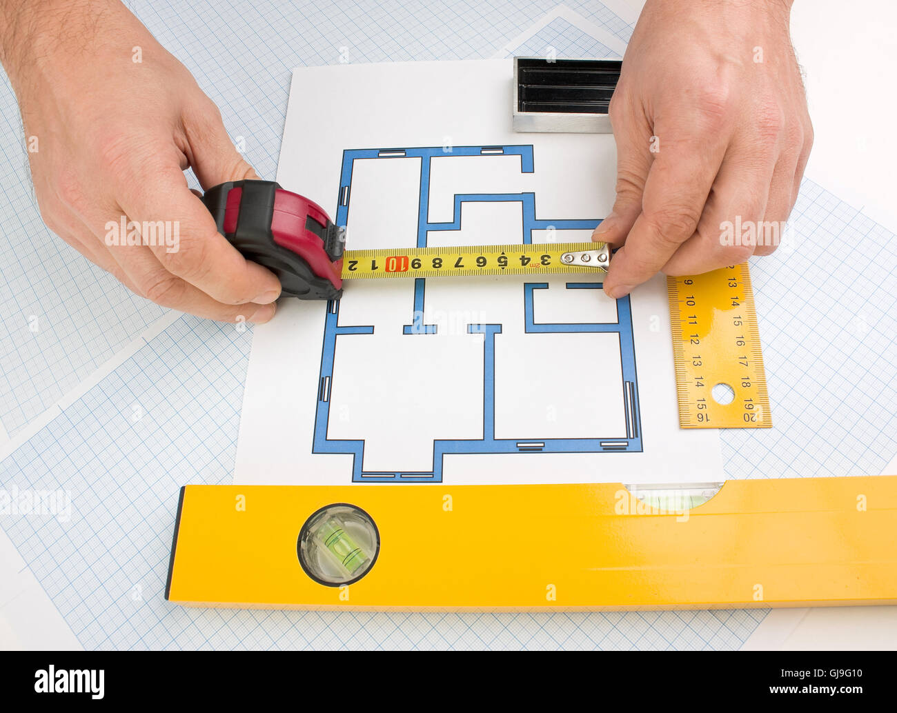 drawing at home with construction tools Stock Photo - Alamy