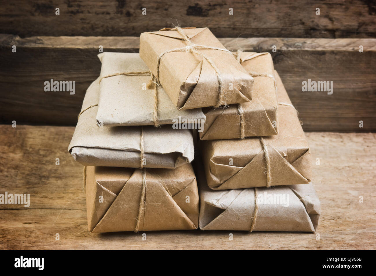 Postage on the background of an old board Stock Photo - Alamy