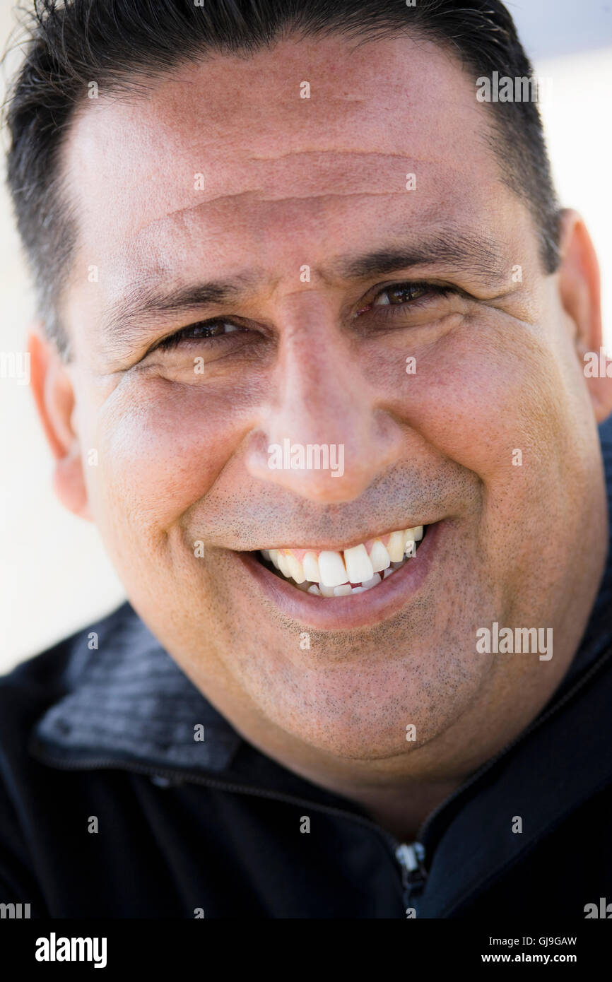 Glad smiling friendly man hi-res stock photography and images - Alamy