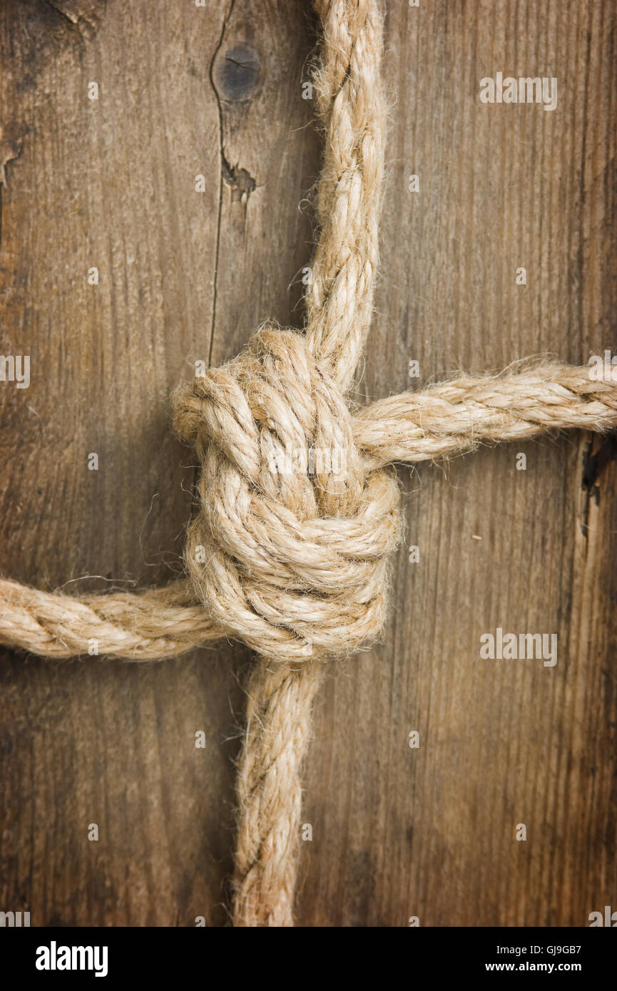 Rope with knots Stock Photo - Alamy