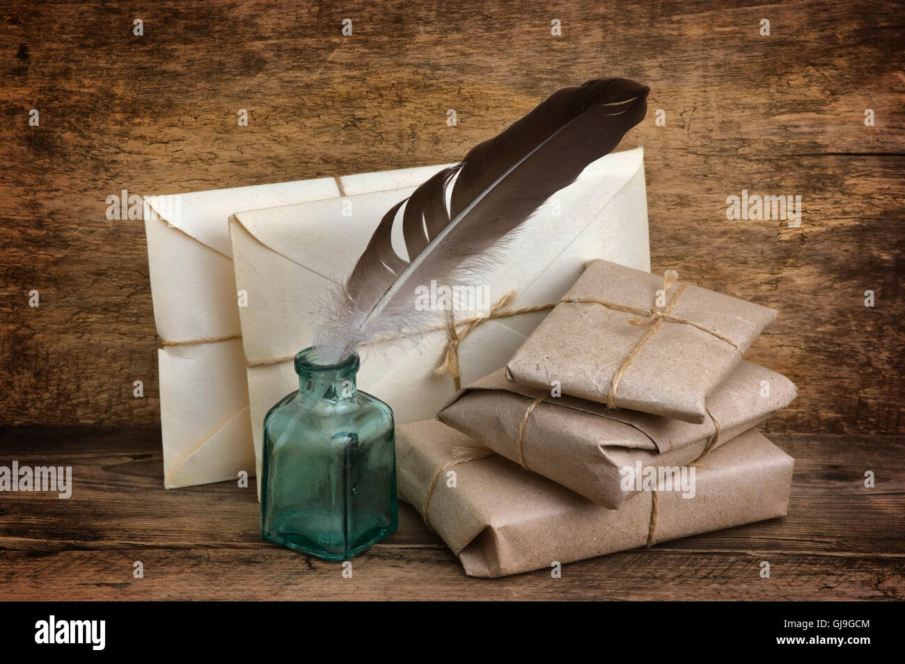 Postage on the background of an old board Stock Photo - Alamy