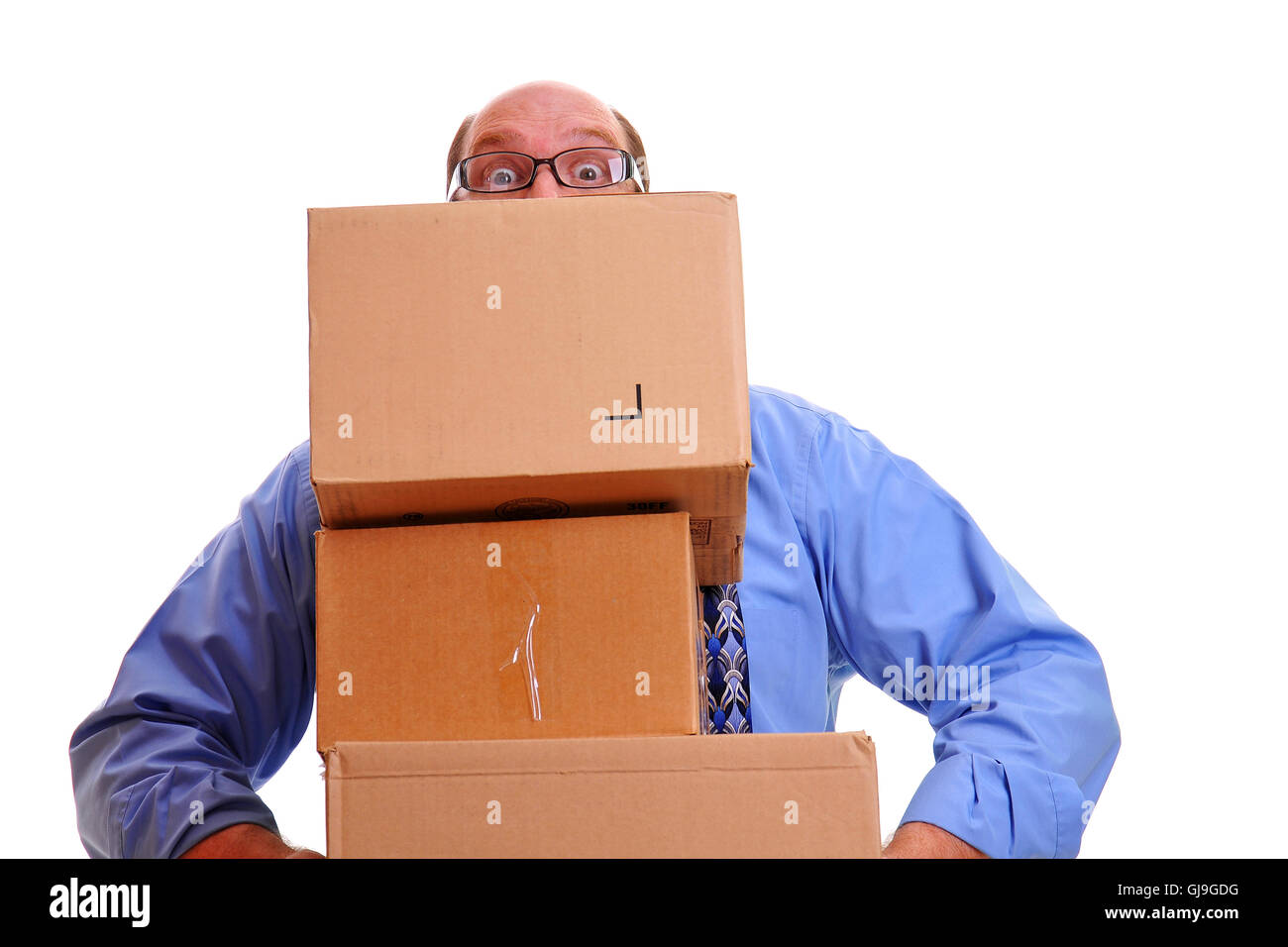 Man carrying heavy boxes Stock Photo - Alamy