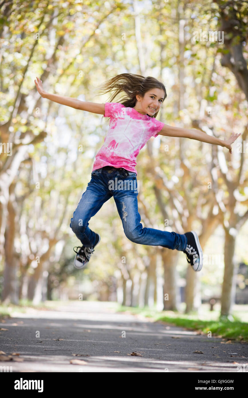 Tween Girl Jumping Stock Photo - Alamy