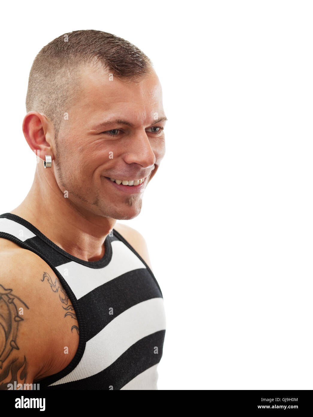 Smiling muscular man Stock Photo - Alamy
