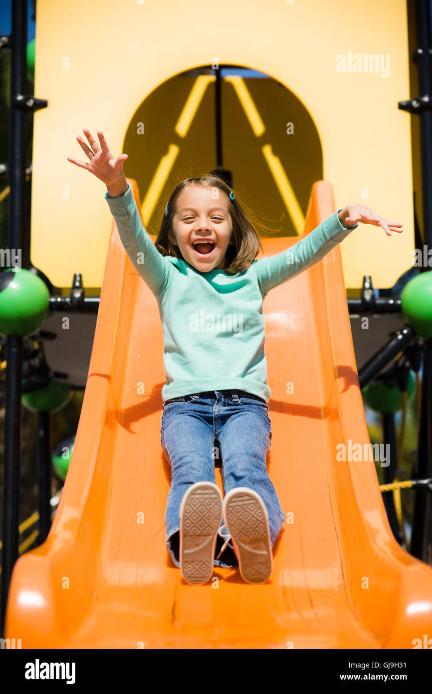 Girl On Slide Stock Photo - Alamy