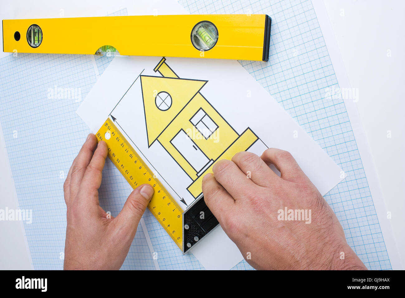 drawing at home with construction tools Stock Photo - Alamy