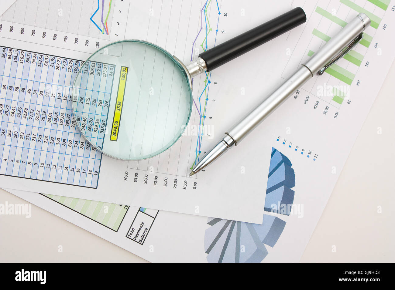 Graphs tables and documents Stock Photo - Alamy