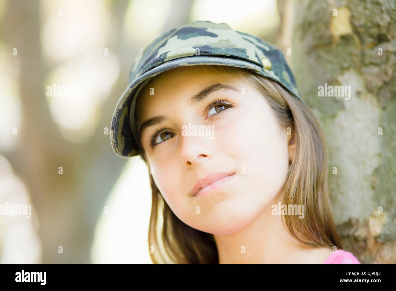 Portrait of Tween Girl in Cap Stock Photo - Alamy