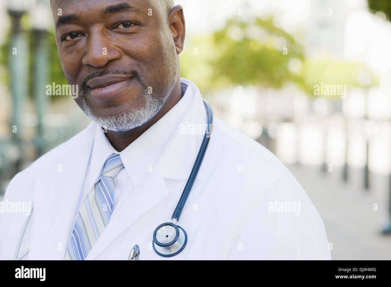 Doctor Smiling To Camera Stock Photo - Alamy
