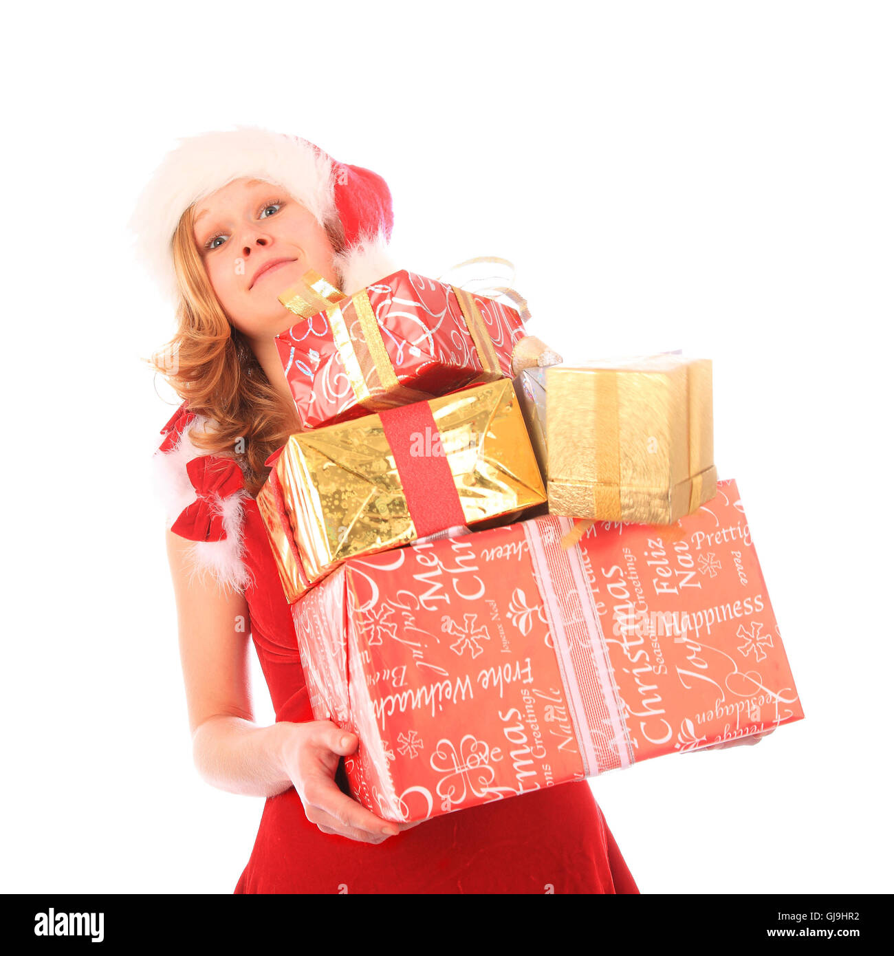 Miss Santa is Carrying too Many Presents Stock Photo - Alamy