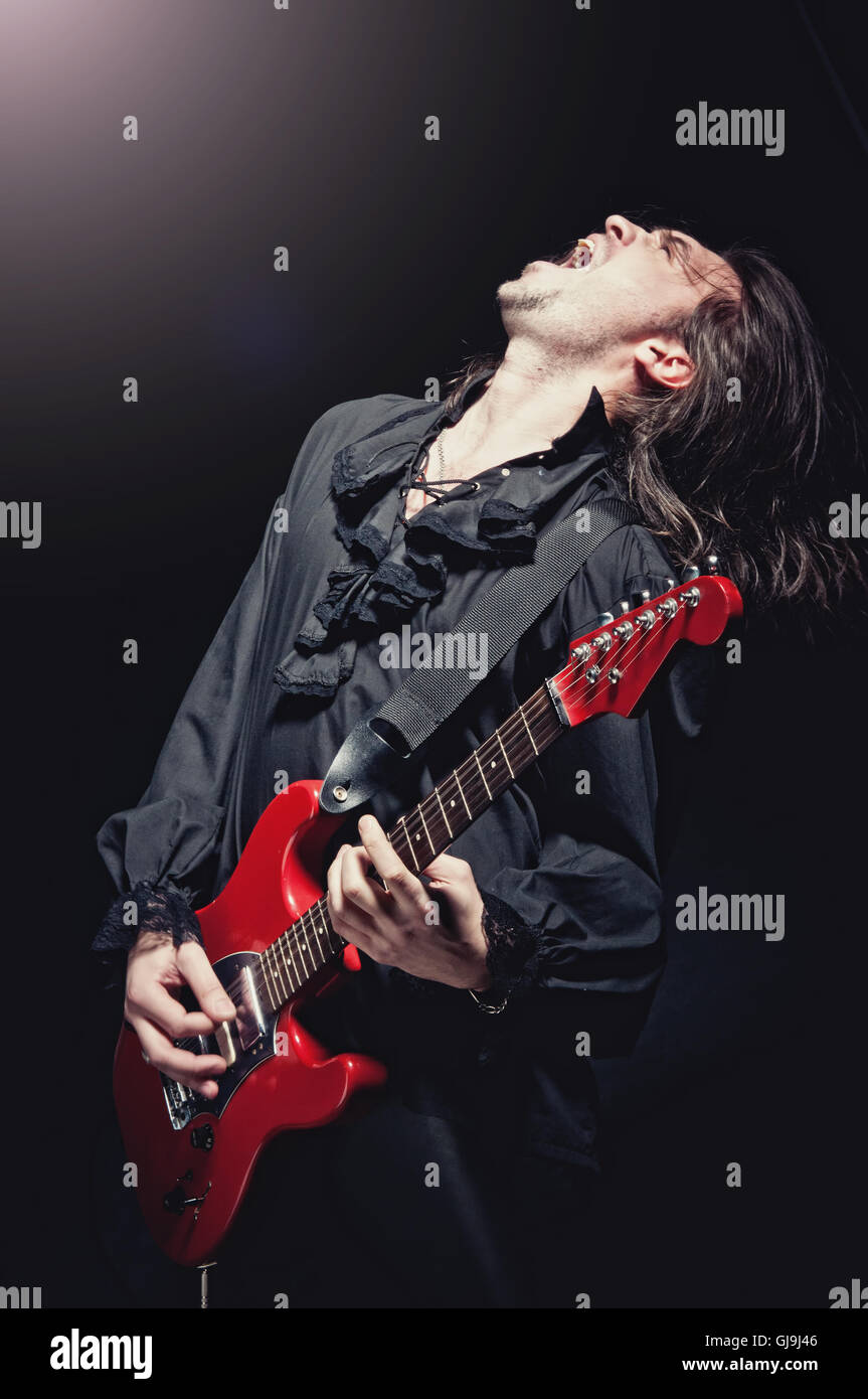 Rock-star playing a concert Stock Photo - Alamy