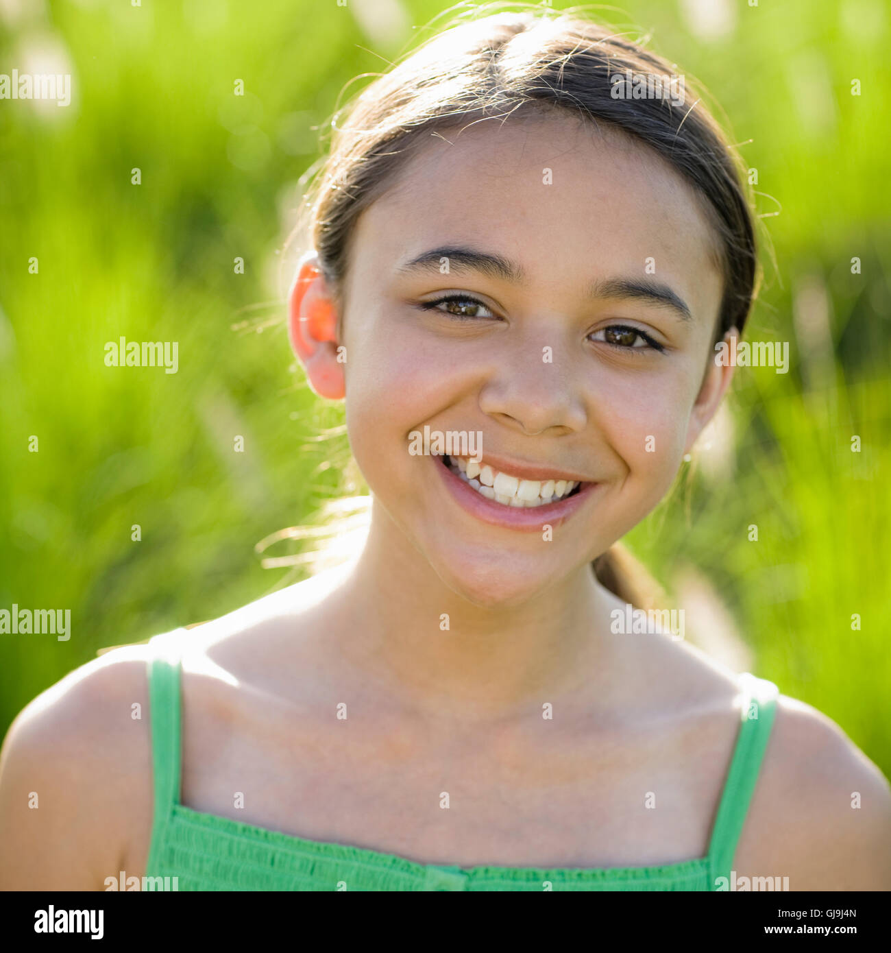 Tween Girl Smiling To Camera Stock Photo - Alamy
