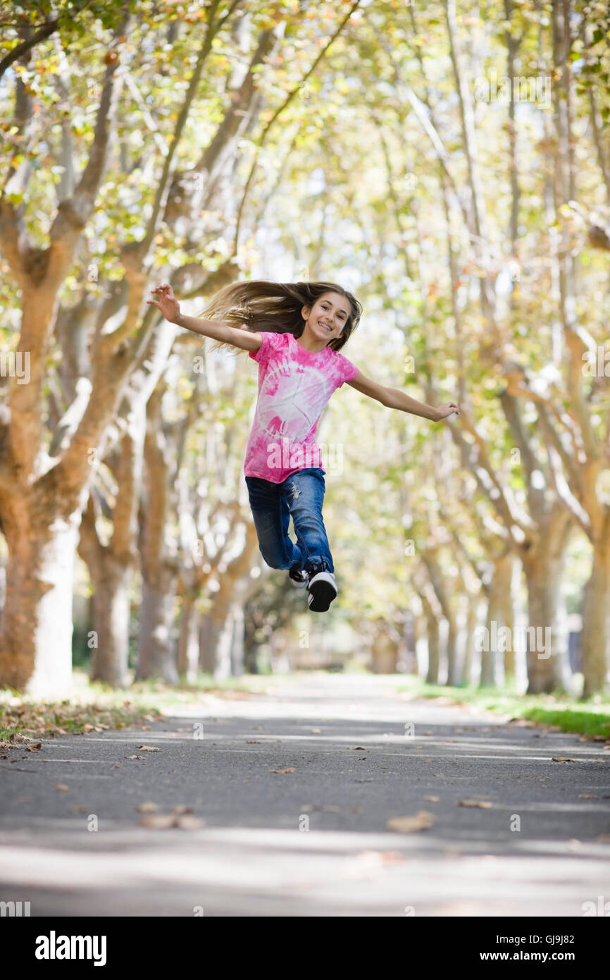 Tween Girl Jumping Stock Photo - Alamy