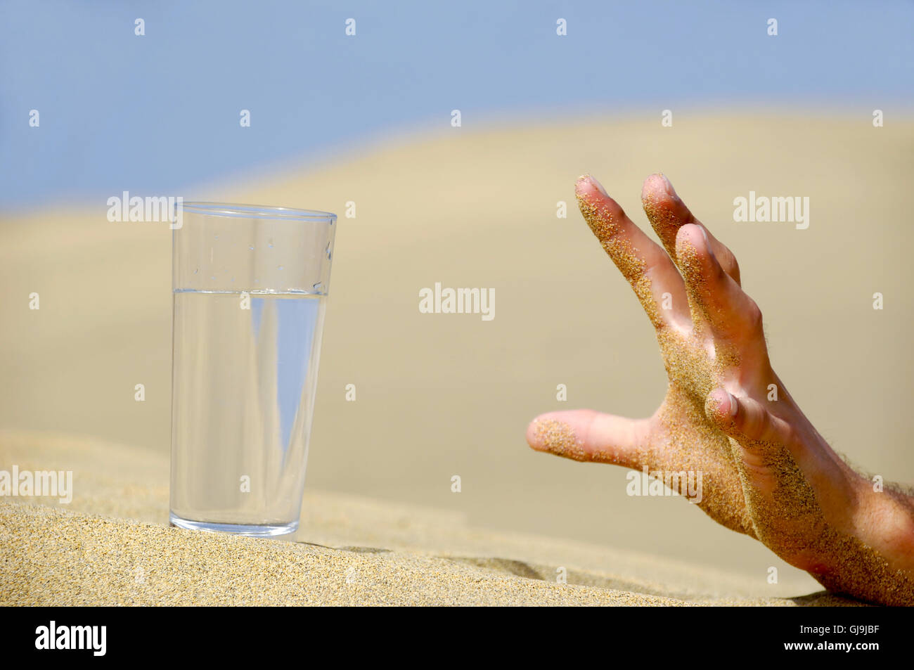 Hand reaching for water Stock Photo - Alamy