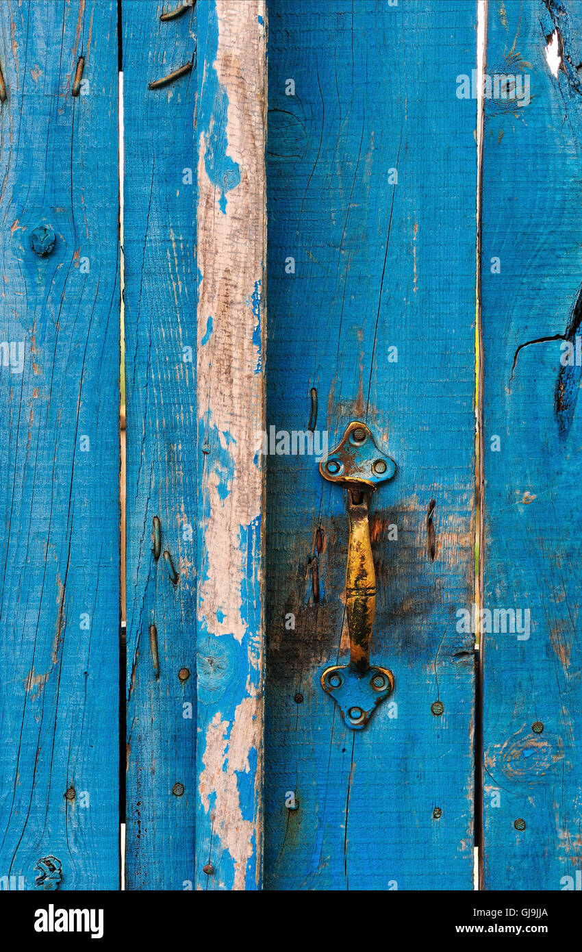 Highly textured blue wooden gate Stock Photo - Alamy