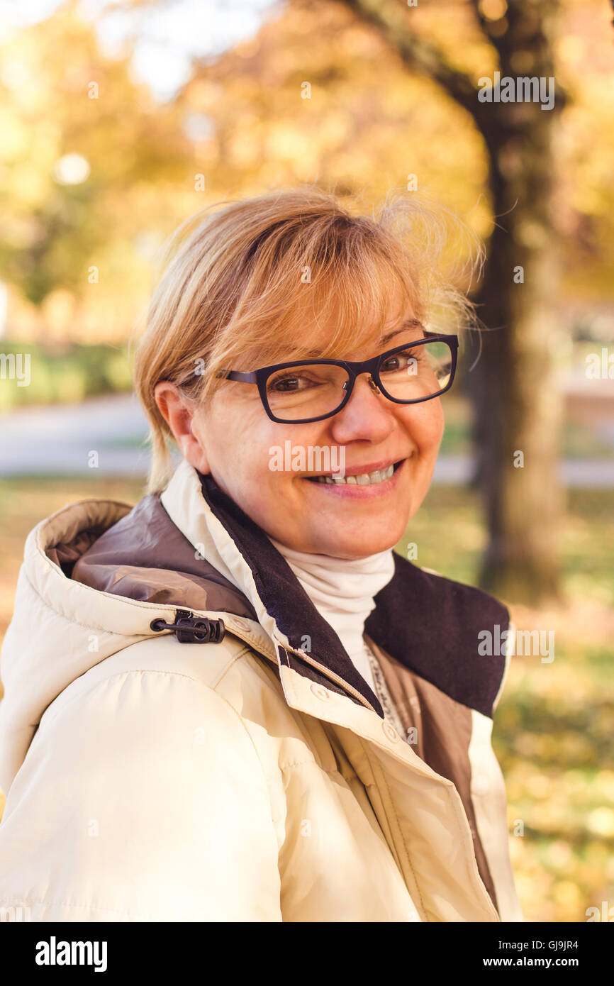 Mature woman enjoying beauty nature hi-res stock photography and images ...