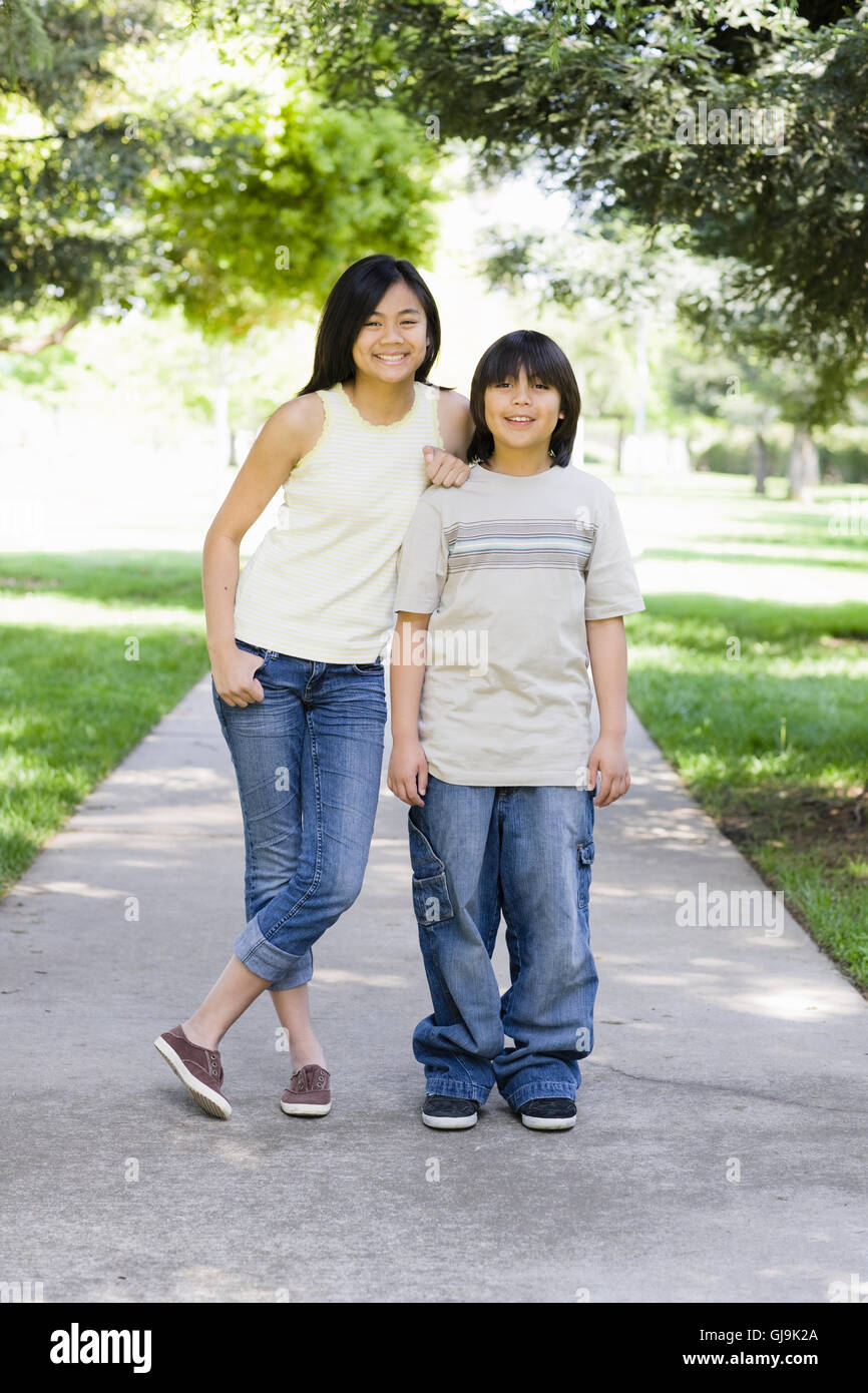 Asian Brother and Sister Smiling To Camera Stock Photo - Alamy