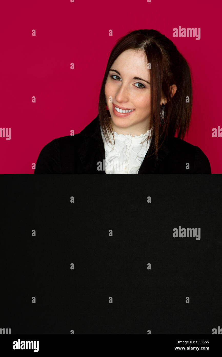 Girl behind white panel hi-res stock photography and images - Alamy