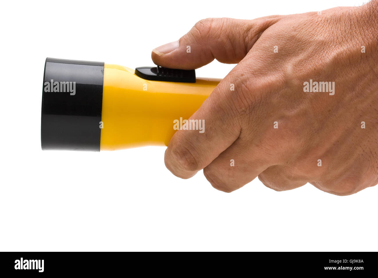 yellow flashlight in hand Stock Photo - Alamy