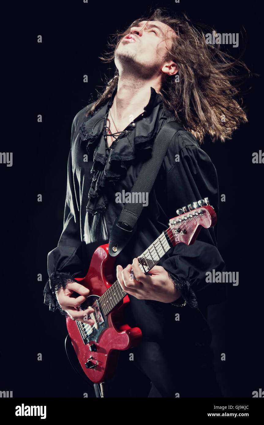Rock-star playing a concert Stock Photo - Alamy