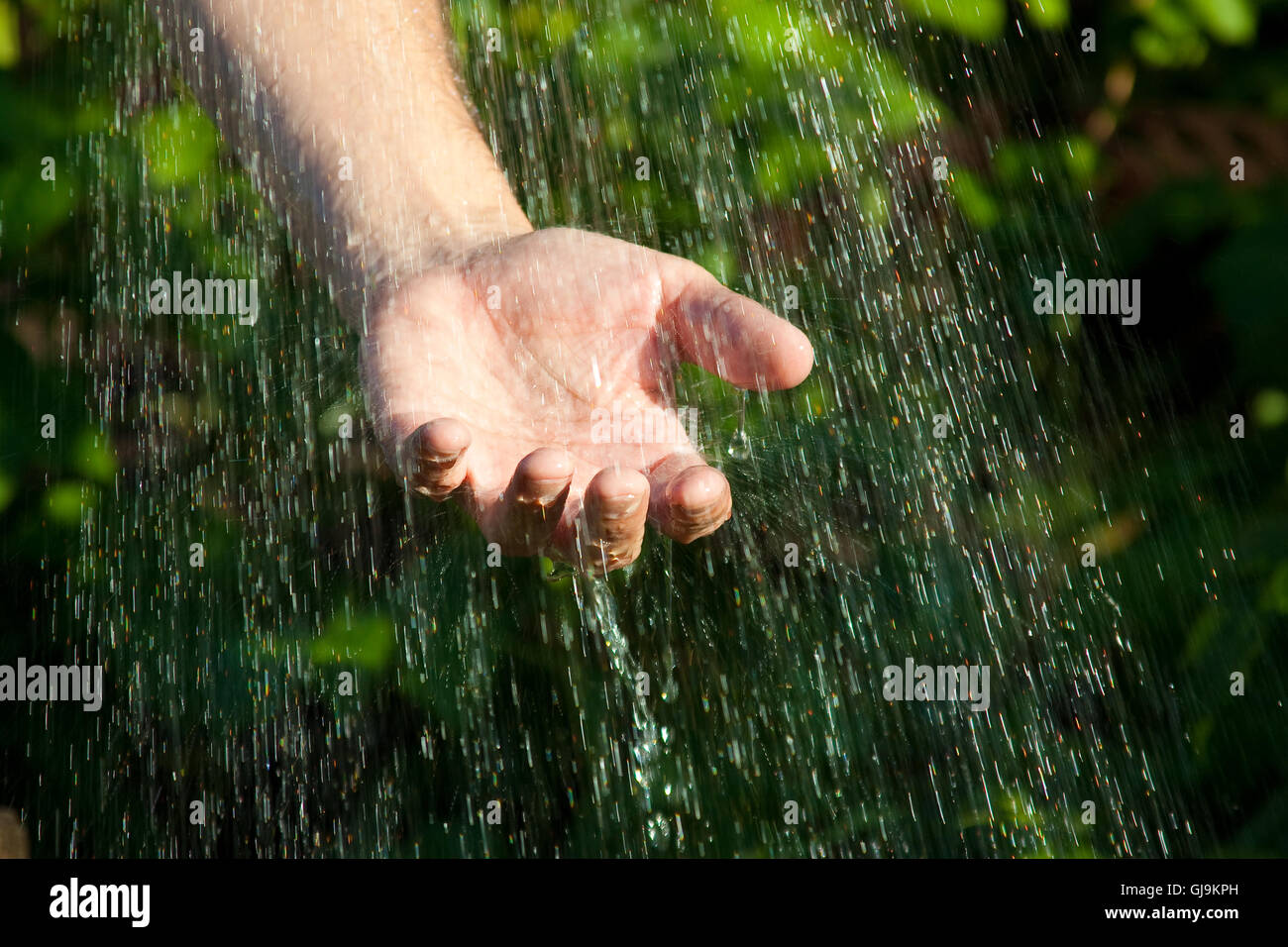 Hand washing in the summer of clean water Stock Photo - Alamy