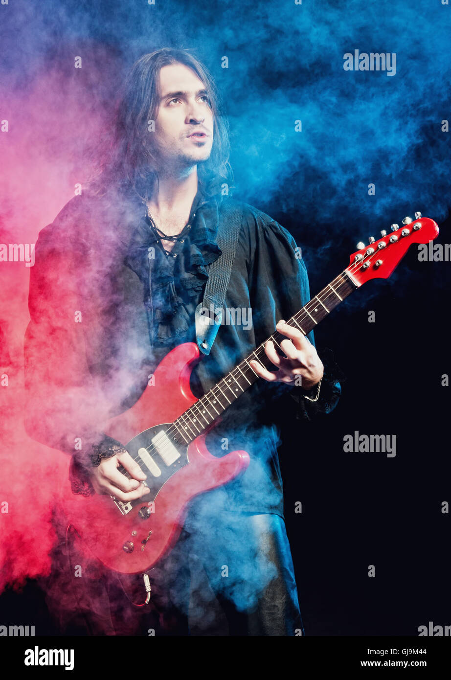Rock-star playing a concert Stock Photo - Alamy