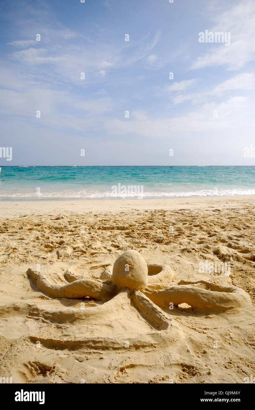Octopus sculpture on beach Stock Photo - Alamy