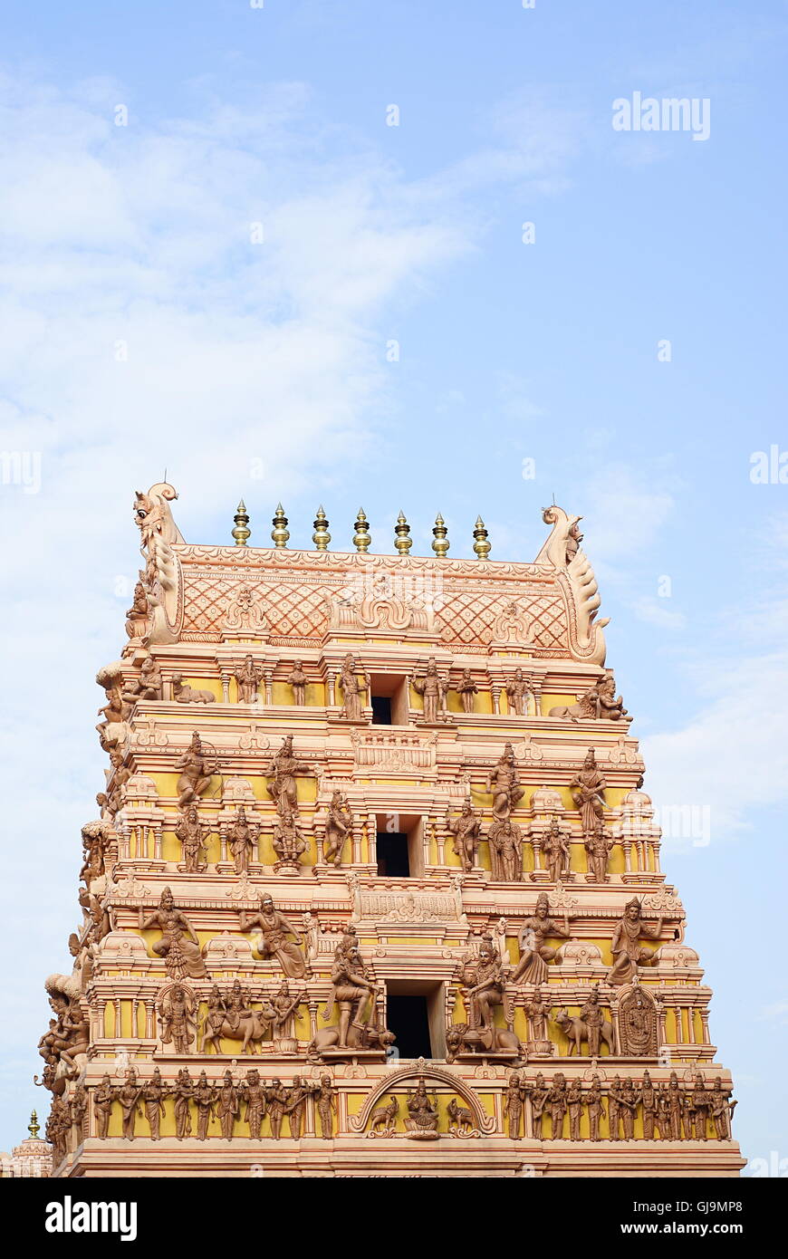 Indian temple top statues and blue sky Stock Photo - Alamy