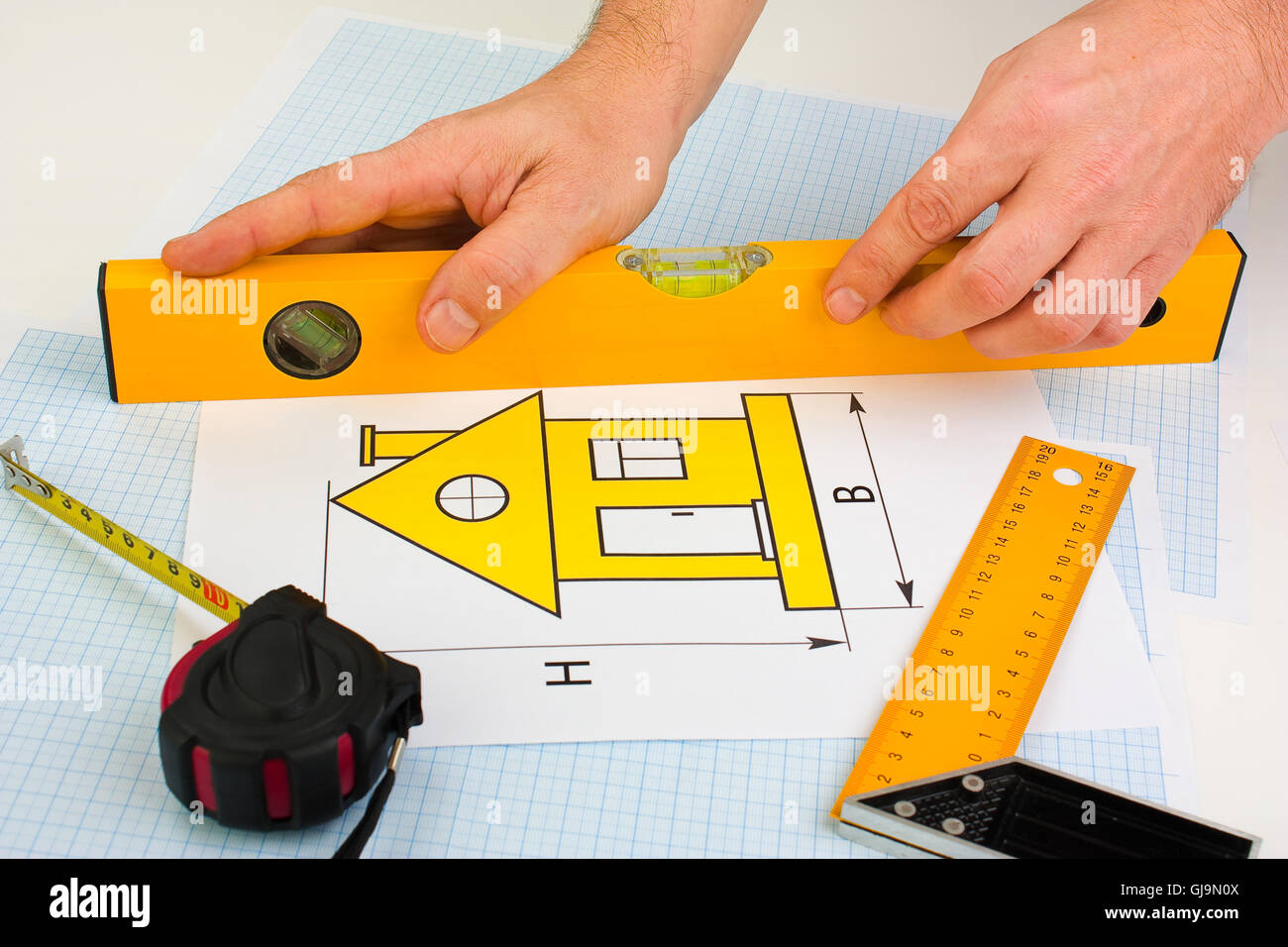 drawing at home with construction tools Stock Photo - Alamy