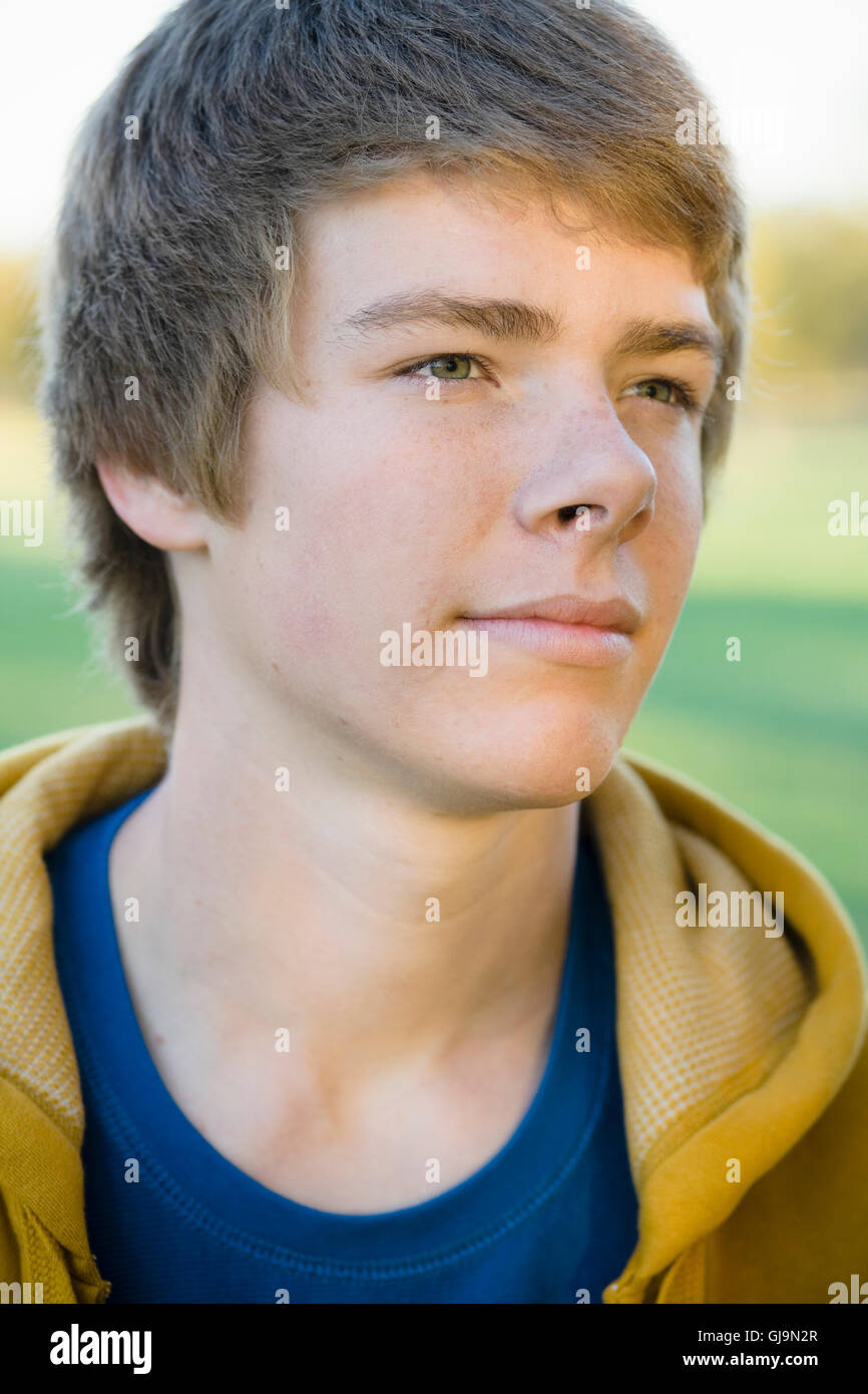 Teen Boy In Park Stock Photo - Alamy