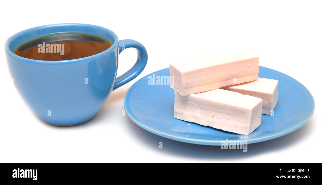 tea cup and candy Stock Photo - Alamy
