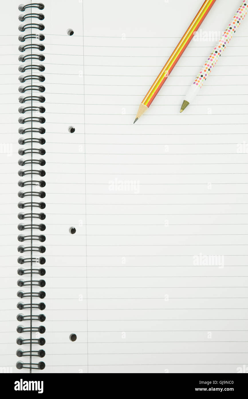 Close up of a Blank white lined Notepad with a pen and pencil o Stock ...